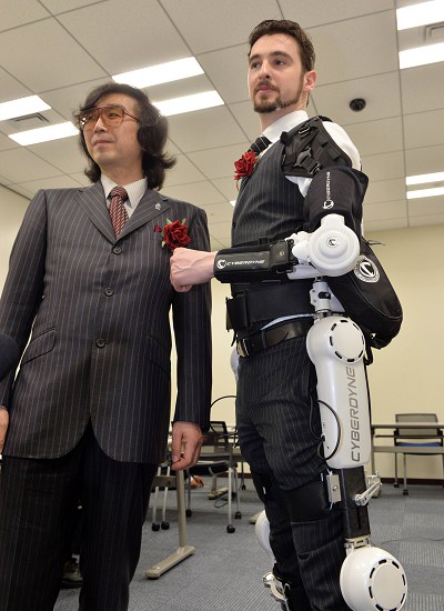 Japan robot suit firm lists on stock market - Business & Finance ...