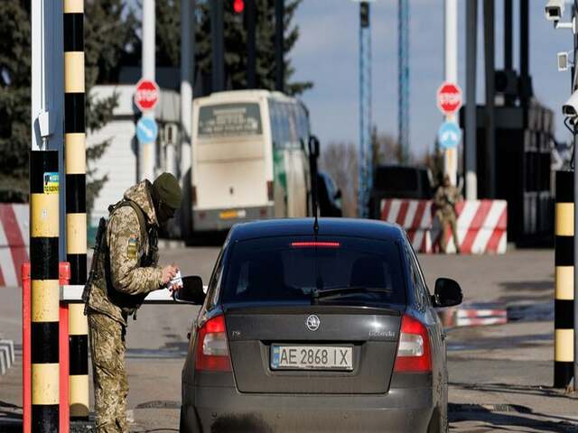 Ukraine imposes state of emergency to face down Russia threat - World ...