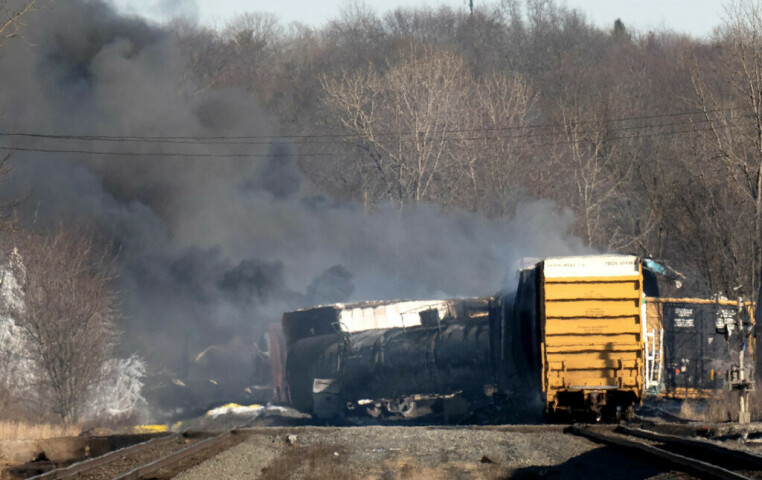 US cargo train derails, causing huge fire and leaking hazardous gas ...